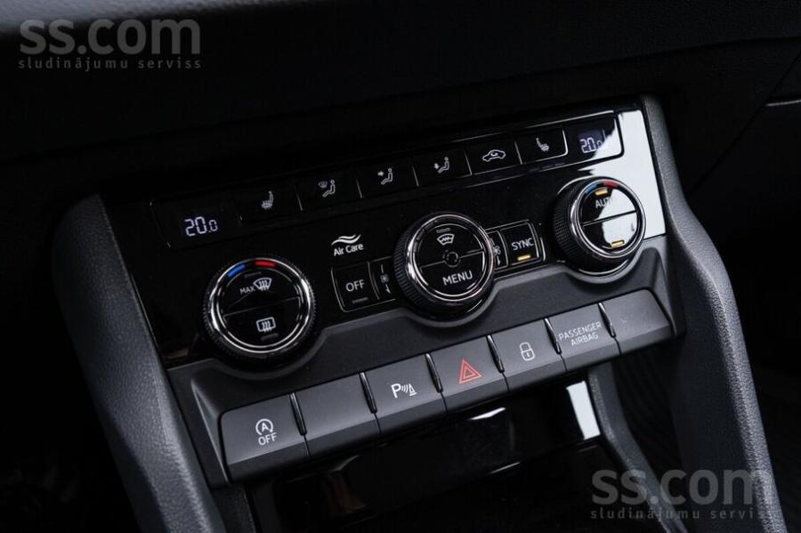 Grey Skoda Karoq 2023 in Riga, with an engine capacity of 1.50 L and mileage of 143 thousand km for 21950 €, photo 14 on AUTOMOTO.COM.LV