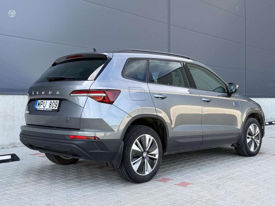 Grey Skoda Karoq 2023 in Siauliai, with an engine capacity of 1.97 L and mileage of 179 thousand km for 18200 €, photo 10 on AUTOMOTO.COM.LV