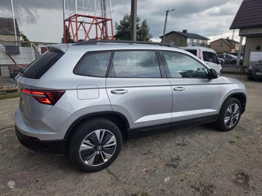 Grey Skoda Karoq 2023 in Taurage, with an engine capacity of 1.97 L and mileage of 201 thousand km for 14300 €, photo 7 on AUTOMOTO.COM.LV