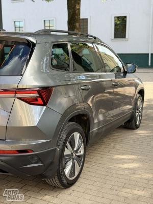 Grey Skoda Karoq 2023 in Vilnius, with an engine capacity of 2.00 L and mileage of 119 thousand km for 18200 €, photo 7 on AUTOMOTO.COM.LV