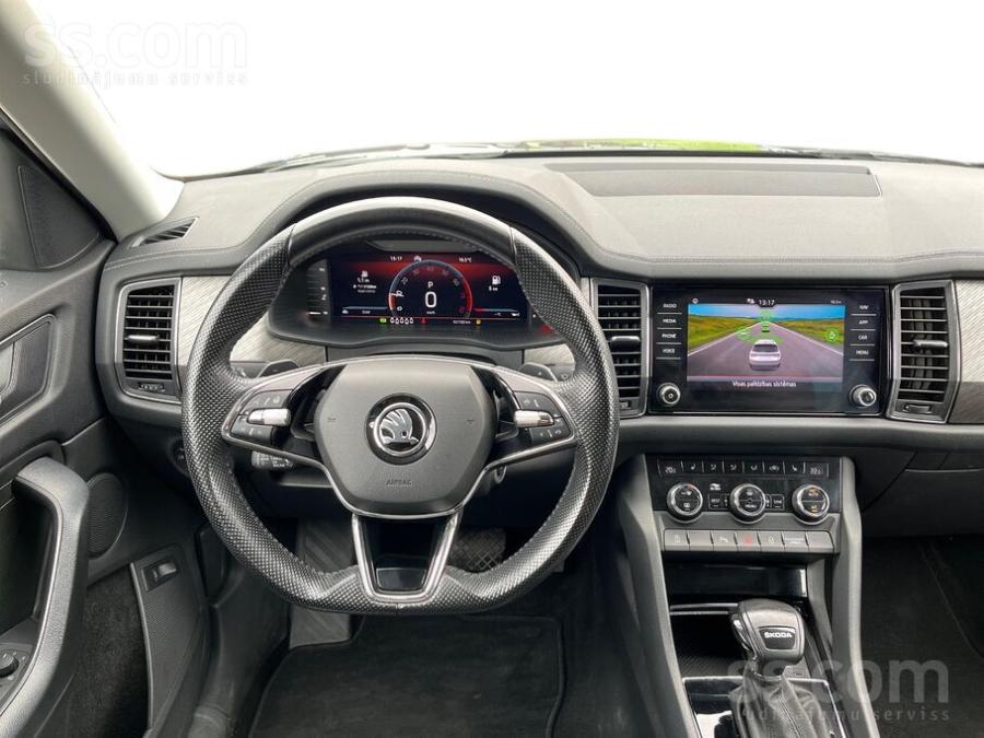 Grey Skoda Karoq 2023 in Riga, with an engine capacity of 1.50 L and mileage of 93 thousand km for 26700 €, photo 10 on AUTOMOTO.COM.LV