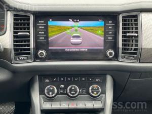 Grey Skoda Karoq 2023 in Riga, with an engine capacity of 1.50 L and mileage of 93 thousand km for 26700 €, photo 15 on AUTOMOTO.COM.LV