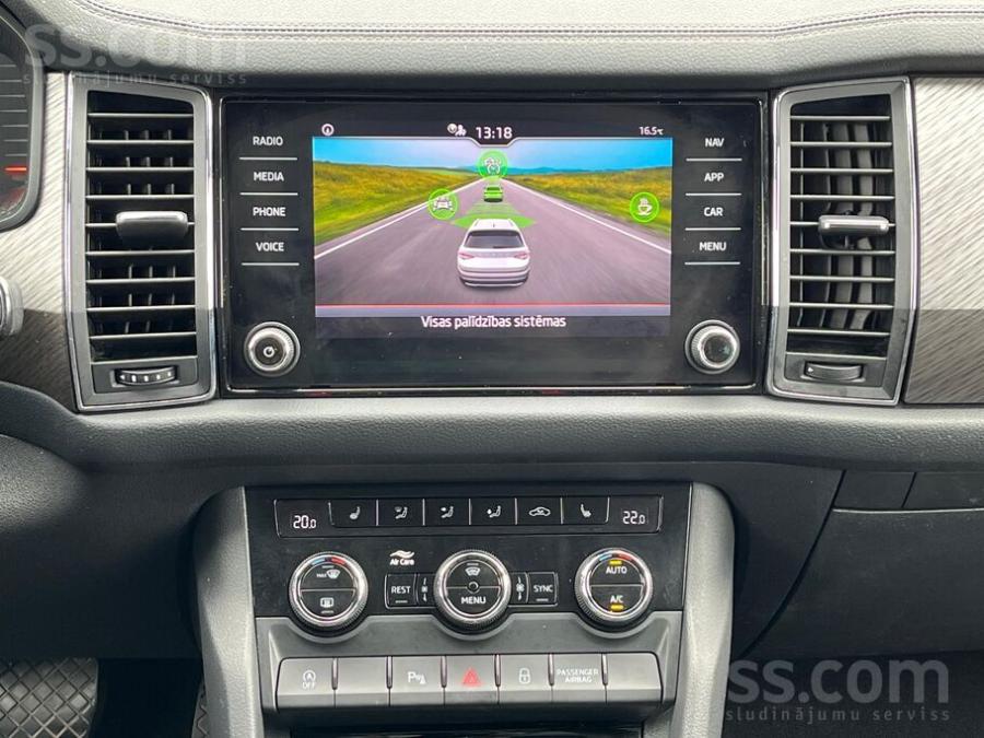 Grey Skoda Karoq 2023 in Riga, with an engine capacity of 1.50 L and mileage of 93 thousand km for 26700 €, photo 15 on AUTOMOTO.COM.LV