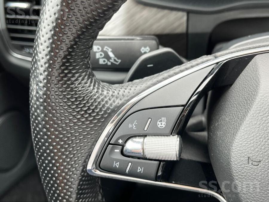 Grey Skoda Karoq 2023 in Riga, with an engine capacity of 1.50 L and mileage of 93 thousand km for 26700 €, photo 20 on AUTOMOTO.COM.LV