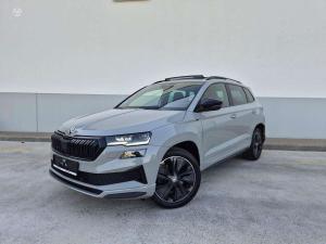 Grey Skoda Karoq 2024 in Kaunas, with an engine capacity of 1.50 L and mileage of 180 thousand km for 16500 €, photo 5 on AUTOMOTO.COM.LV