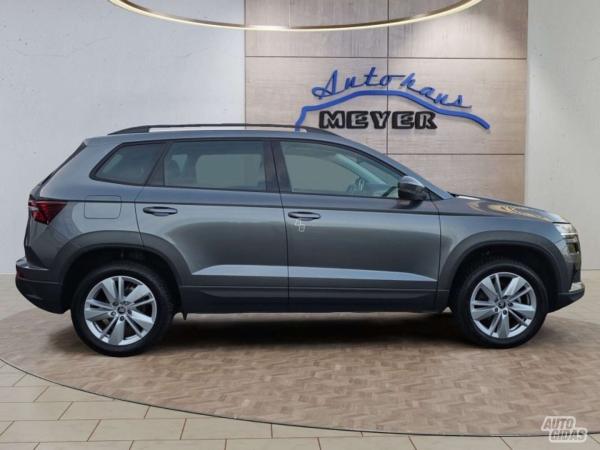 Grey Skoda Karoq 2025 in Kaunas, with an engine capacity of 1.00 L and mileage of 21 thousand km for 27888 €, photo 6 on AUTOMOTO.COM.LV