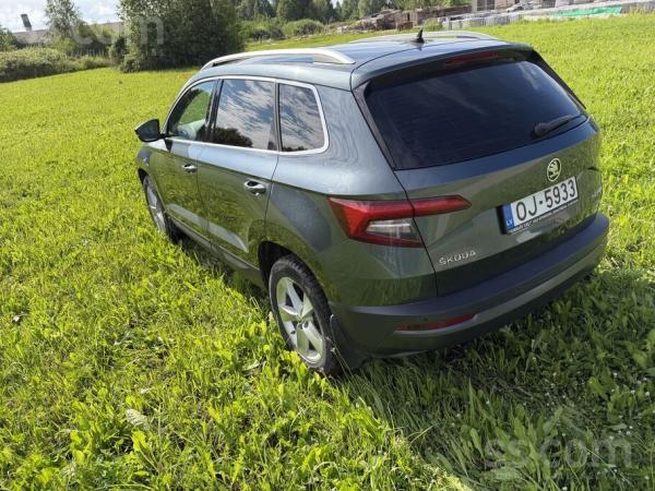 Grey Skoda Karoq 2019 in Limbazi, with an engine capacity of 2.00 L and mileage of 230 thousand km for 11200 €, photo 4 on AUTOMOTO.COM.LV