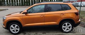 Оранжевый Шкода Karoq 2024 в Рига, объемом двигателя 1.50 л и пробегом 19 тыс. км за 25000 €, фото  на AUTOMOTO.COM.LV