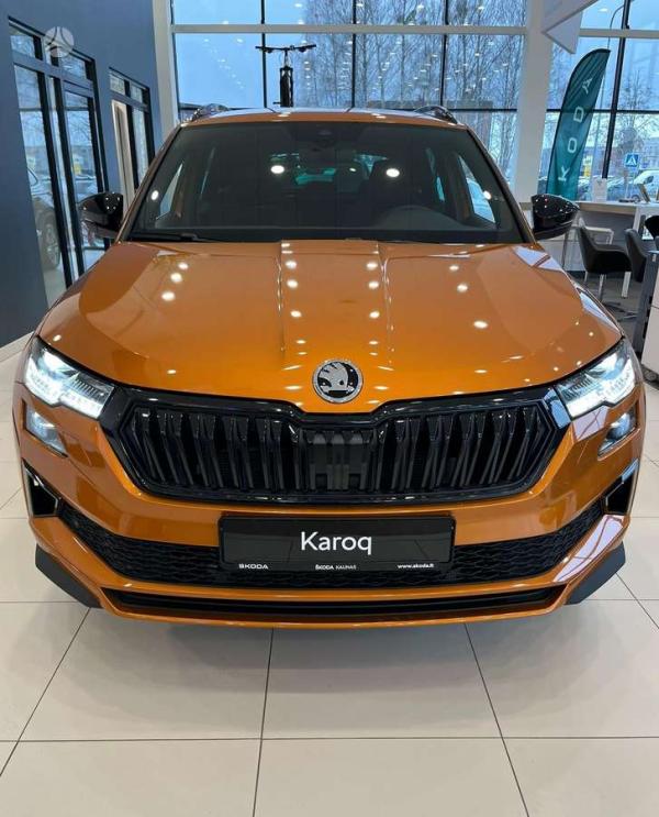Oranžs Skoda Karoq 2026 Kauņa, ar dzinēja tilpumu 1.50 L un nobraukumu 0 tūkst. km par 34690 €, foto 2 vietnē AUTOMOTO.COM.LV