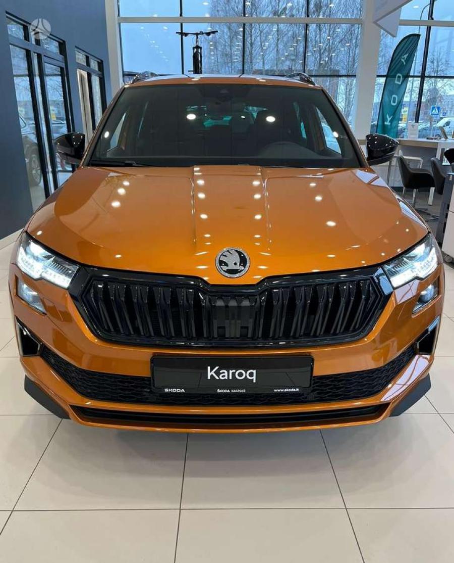 Orange Skoda Karoq 2026 in Kaunas, with an engine capacity of 1.50 L and mileage of 0 thousand km for 34690 €, photo 3 on AUTOMOTO.COM.LV