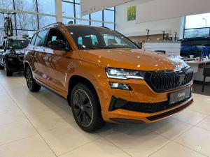 Orange Skoda Karoq 2026 in Kaunas, with an engine capacity of 1.50 L and mileage of 0 thousand km for 34690 €, photo 5 on AUTOMOTO.COM.LV