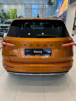 Orange Skoda Karoq 2026 in Kaunas, with an engine capacity of 1.50 L and mileage of 0 thousand km for 34690 €, photo 7 on AUTOMOTO.COM.LV