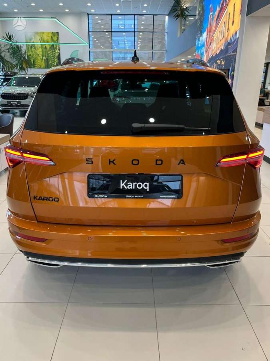 Orange Skoda Karoq 2026 in Kaunas, with an engine capacity of 1.50 L and mileage of 0 thousand km for 34690 €, photo 7 on AUTOMOTO.COM.LV