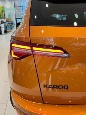Orange Skoda Karoq 2026 in Kaunas, with an engine capacity of 1.50 L and mileage of 0 thousand km for 34690 €, photo 9 on AUTOMOTO.COM.LV