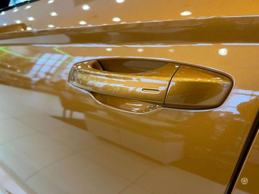 Orange Skoda Karoq 2026 in Kaunas, with an engine capacity of 1.50 L and mileage of 0 thousand km for 34690 €, photo 10 on AUTOMOTO.COM.LV