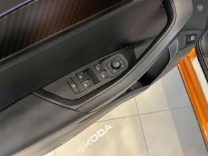 Orange Skoda Karoq 2026 in Kaunas, with an engine capacity of 1.50 L and mileage of 0 thousand km for 34690 €, photo 12 on AUTOMOTO.COM.LV