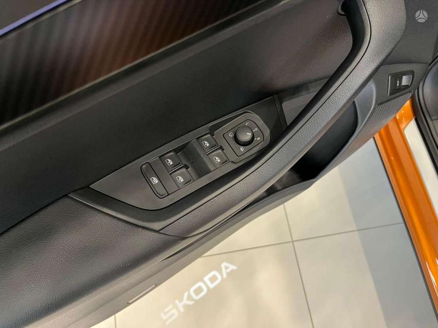 Orange Skoda Karoq 2026 in Kaunas, with an engine capacity of 1.50 L and mileage of 0 thousand km for 34690 €, photo 12 on AUTOMOTO.COM.LV