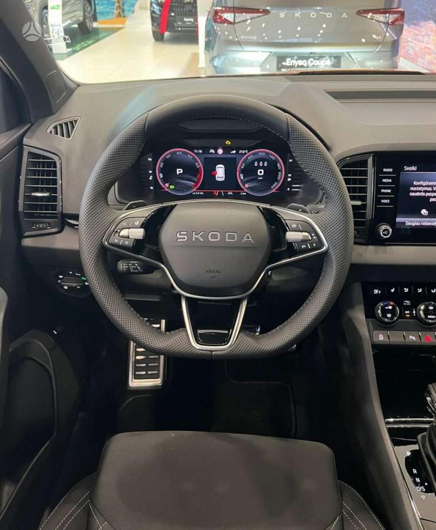 Orange Skoda Karoq 2026 in Kaunas, with an engine capacity of 1.50 L and mileage of 0 thousand km for 34690 €, photo 15 on AUTOMOTO.COM.LV