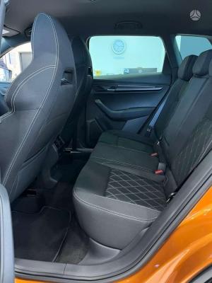 Orange Skoda Karoq 2026 in Kaunas, with an engine capacity of 1.50 L and mileage of 0 thousand km for 34690 €, photo 24 on AUTOMOTO.COM.LV