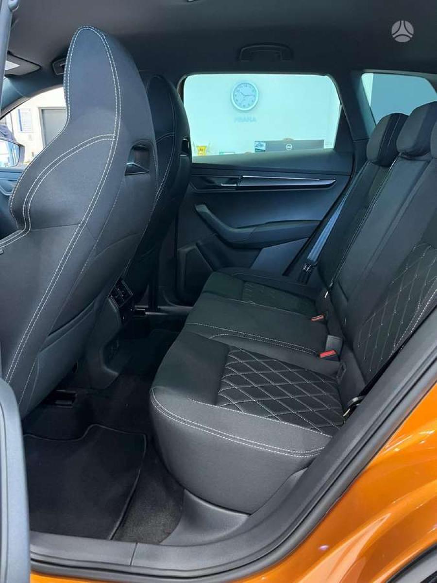Orange Skoda Karoq 2026 in Kaunas, with an engine capacity of 1.50 L and mileage of 0 thousand km for 34690 €, photo 24 on AUTOMOTO.COM.LV