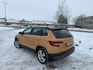 Orange Skoda Karoq 2018 in Tallinn, with an engine capacity of 2.00 L and mileage of 141 thousand km for 19900 €, photo 4 on AUTOMOTO.COM.LV