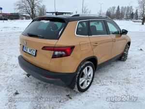 Orange Skoda Karoq 2018 in Tallinn, with an engine capacity of 2.00 L and mileage of 141 thousand km for 19900 €, photo 5 on AUTOMOTO.COM.LV