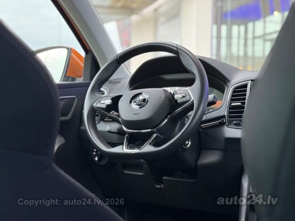 Orange Skoda Karoq 2023 in Tartu, with an engine capacity of 2.00 L and mileage of 71 thousand km for 23990 €, photo 11 on AUTOMOTO.COM.LV