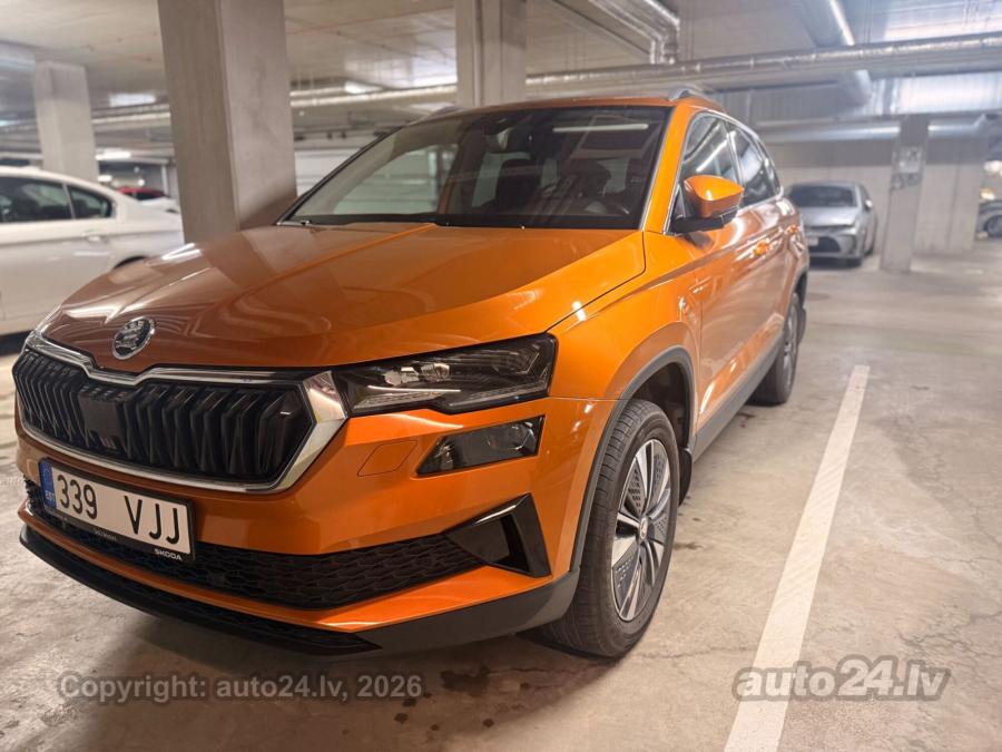 Orange Skoda Karoq 2023 in Tallinn, with an engine capacity of 1.50 L and mileage of 16 thousand km for 26500 €, photo 1 on AUTOMOTO.COM.LV
