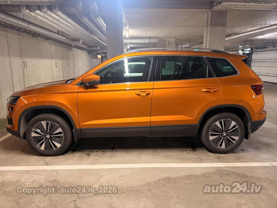 Orange Skoda Karoq 2023 in Tallinn, with an engine capacity of 1.50 L and mileage of 16 thousand km for 26500 €, photo 3 on AUTOMOTO.COM.LV