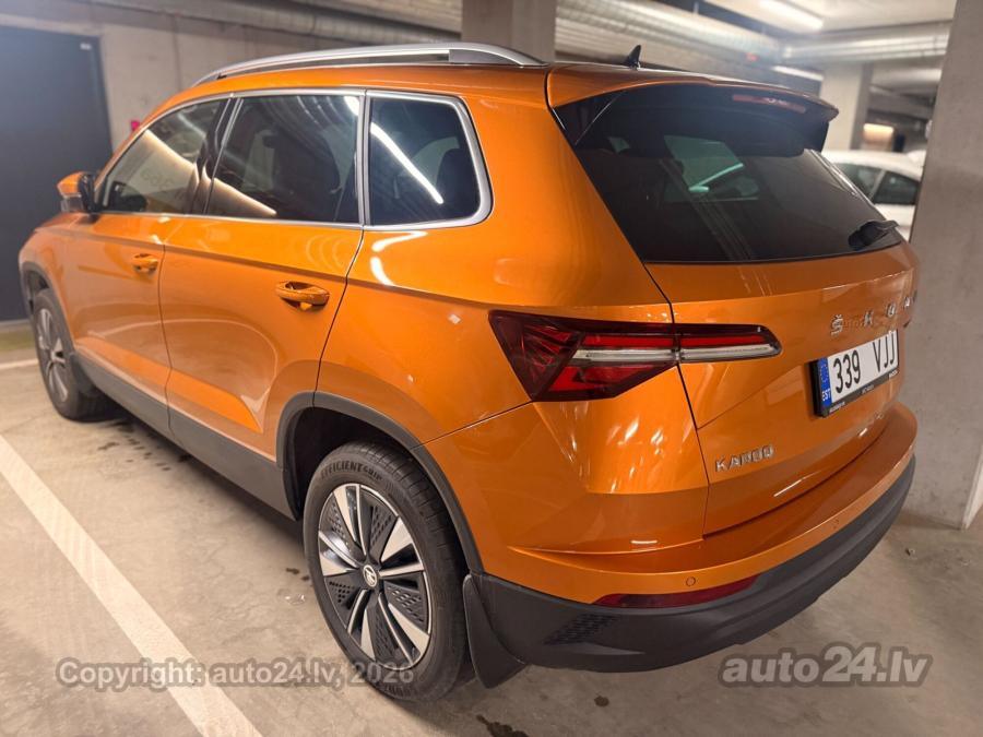 Orange Skoda Karoq 2023 in Tallinn, with an engine capacity of 1.50 L and mileage of 16 thousand km for 26500 €, photo 4 on AUTOMOTO.COM.LV