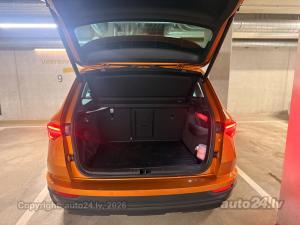 Orange Skoda Karoq 2023 in Tallinn, with an engine capacity of 1.50 L and mileage of 16 thousand km for 26500 €, photo 6 on AUTOMOTO.COM.LV