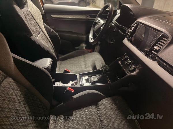 Orange Skoda Karoq 2023 in Tallinn, with an engine capacity of 1.50 L and mileage of 16 thousand km for 26500 €, photo 8 on AUTOMOTO.COM.LV
