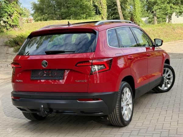 Red Skoda Karoq 2018 in Prienai, with an engine capacity of 1.60 L and mileage of 245 thousand km for 13950 €, photo 9 on AUTOMOTO.COM.LV