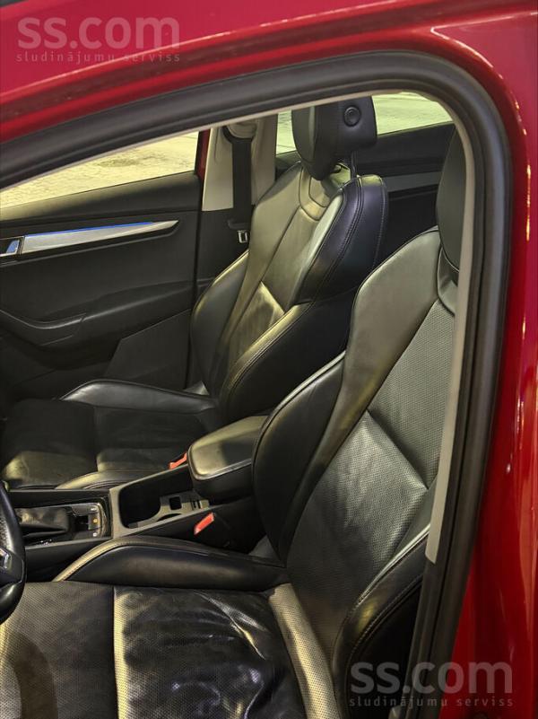 Red Skoda Karoq 2020 in Riga, with an engine capacity of 1.50 L and mileage of 101 thousand km for 17800 €, photo 5 on AUTOMOTO.COM.LV
