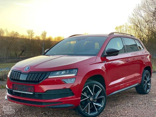 Red Skoda Karoq 2021 in Kaunas, with an engine capacity of 1.50 L and mileage of 94 thousand km for 23111 €, photo 2 on AUTOMOTO.COM.LV