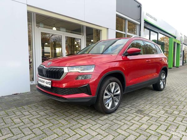Red Skoda Karoq 2022 in Kaunas, with an engine capacity of 2.00 L and mileage of 75 thousand km for 32031 €, photo 1 on AUTOMOTO.COM.LV