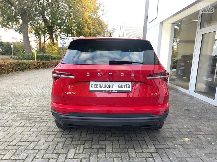 Red Skoda Karoq 2022 in Kaunas, with an engine capacity of 2.00 L and mileage of 75 thousand km for 32031 €, photo 4 on AUTOMOTO.COM.LV