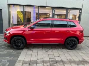 Sarkans Skoda Karoq 2022 Kauņa, ar dzinēja tilpumu 2.00 L un nobraukumu 60 tūkst. km par 32649 €, foto  vietnē AUTOMOTO.COM.LV