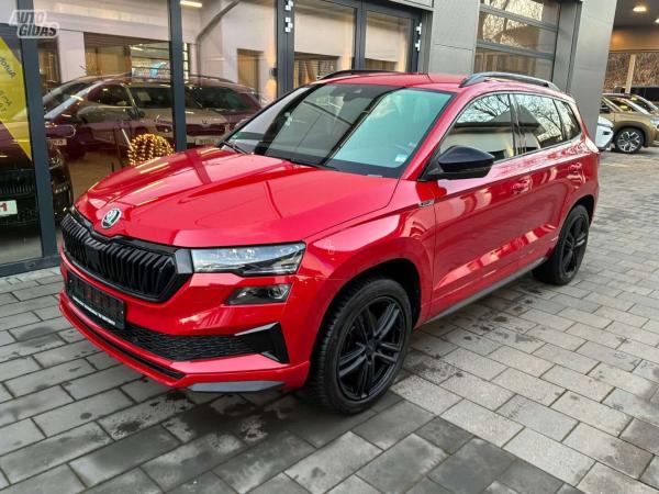 Red Skoda Karoq 2022 in Kaunas, with an engine capacity of 2.00 L and mileage of 60 thousand km for 32649 €, photo 3 on AUTOMOTO.COM.LV