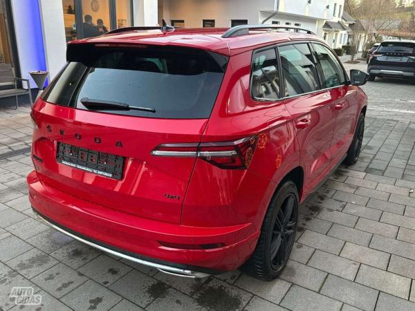 Red Skoda Karoq 2022 in Kaunas, with an engine capacity of 2.00 L and mileage of 60 thousand km for 32649 €, photo 5 on AUTOMOTO.COM.LV