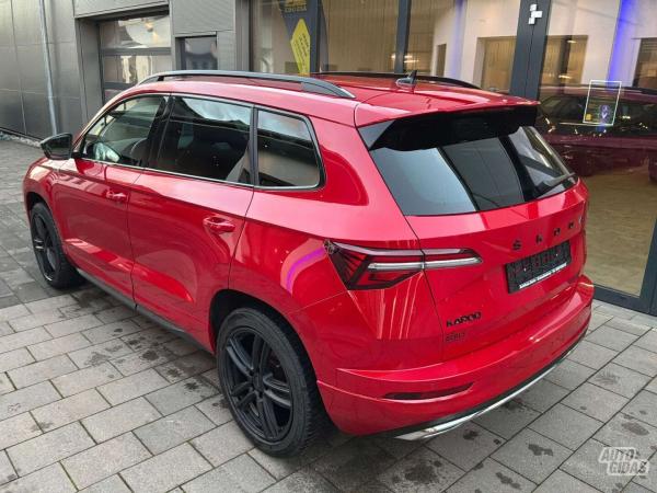 Red Skoda Karoq 2022 in Kaunas, with an engine capacity of 2.00 L and mileage of 60 thousand km for 32649 €, photo 6 on AUTOMOTO.COM.LV
