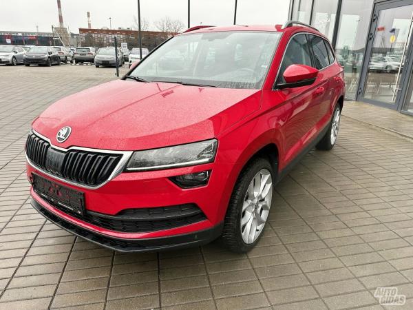 Red Skoda Karoq 2022 in Kaunas, with an engine capacity of 1.00 L and mileage of 194 thousand km for 14400 €, photo 1 on AUTOMOTO.COM.LV