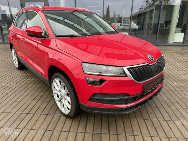 Red Skoda Karoq 2022 in Kaunas, with an engine capacity of 1.00 L and mileage of 194 thousand km for 14400 €, photo 2 on AUTOMOTO.COM.LV