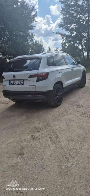 White Skoda Karoq 2017 in Kaisiadorys, with an engine capacity of 1.97 L and mileage of 289 thousand km for 14500 €, photo 5 on AUTOMOTO.COM.LV