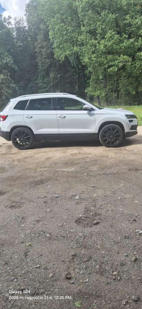 White Skoda Karoq 2017 in Kaisiadorys, with an engine capacity of 1.97 L and mileage of 289 thousand km for 14500 €, photo 8 on AUTOMOTO.COM.LV
