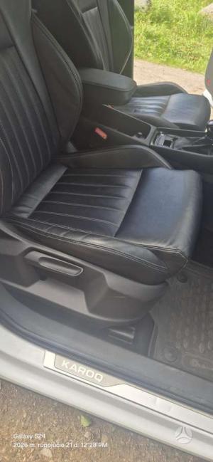 White Skoda Karoq 2017 in Kaisiadorys, with an engine capacity of 1.97 L and mileage of 289 thousand km for 14500 €, photo 15 on AUTOMOTO.COM.LV