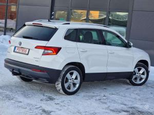 White Skoda Karoq 2018 in Jonava, with an engine capacity of 2.00 L and mileage of 221 thousand km for 16600 €, photo 5 on AUTOMOTO.COM.LV