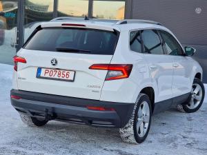 White Skoda Karoq 2018 in Jonava, with an engine capacity of 2.00 L and mileage of 221 thousand km for 16600 €, photo 6 on AUTOMOTO.COM.LV