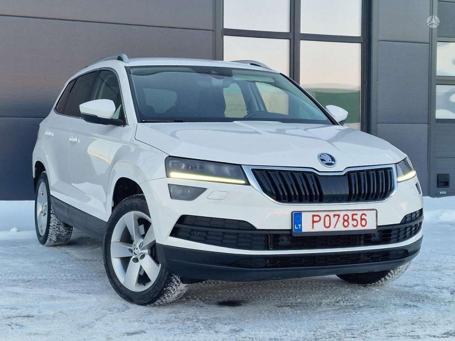 White Skoda Karoq 2018 in Jonava, with an engine capacity of 2.00 L and mileage of 221 thousand km for 16600 €, photo 12 on AUTOMOTO.COM.LV