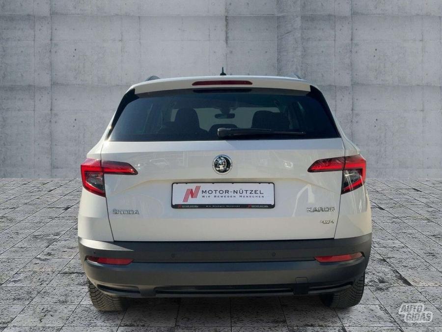 White Skoda Karoq 2019 in Kaunas, with an engine capacity of 2.00 L and mileage of 87 thousand km for 22694 €, photo 5 on AUTOMOTO.COM.LV